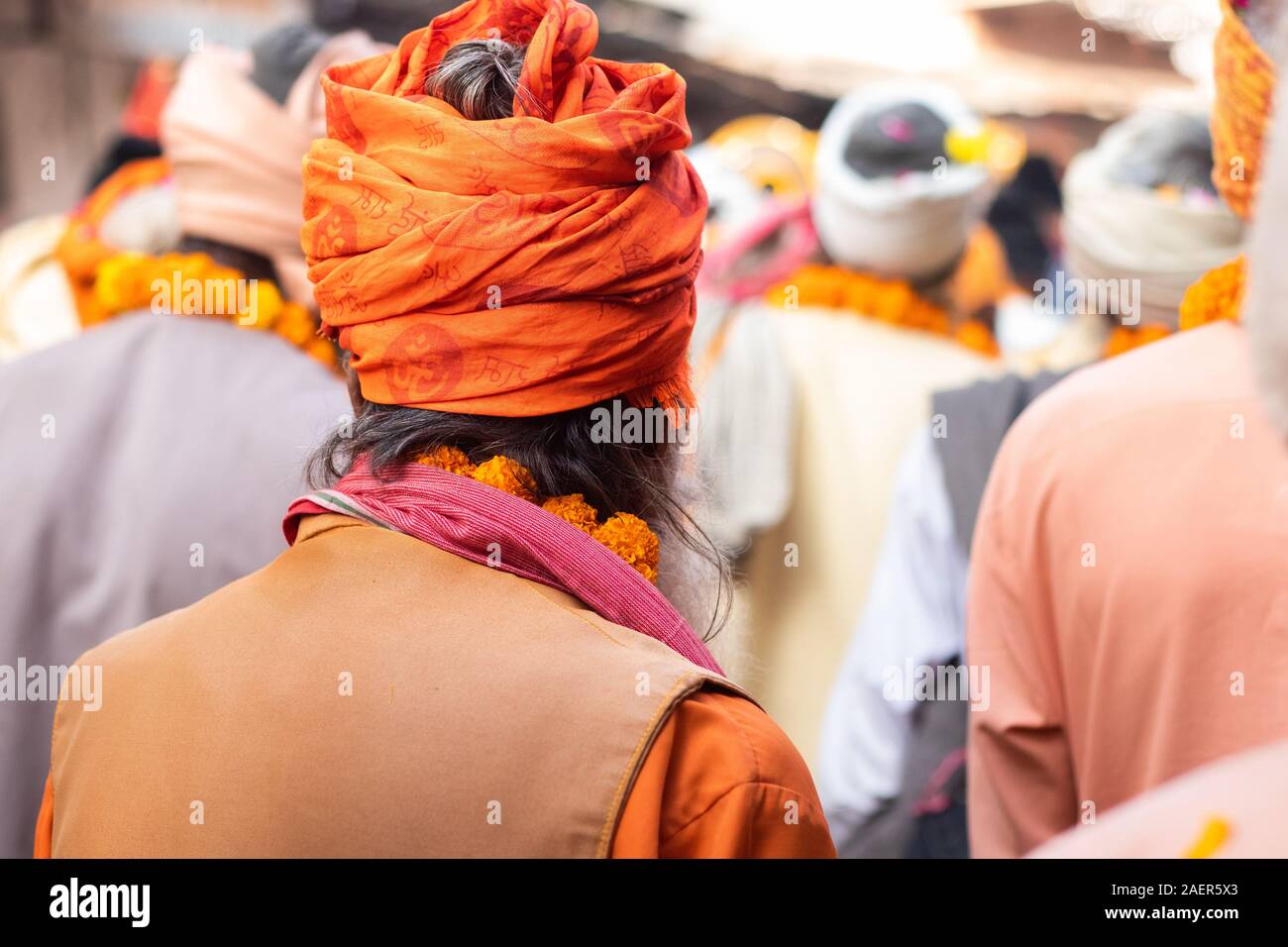 Indian sadhu in crowd going for spiritual rally. Indian sage wearing ...