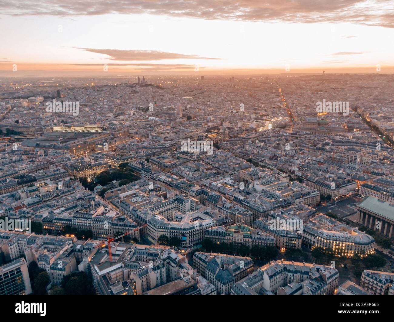 erial drone shot of the Cityscape of Paris, France with the Arc de ...