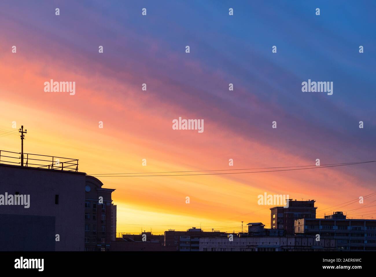 Colorful sunset over roof houses hi-res stock photography and images ...