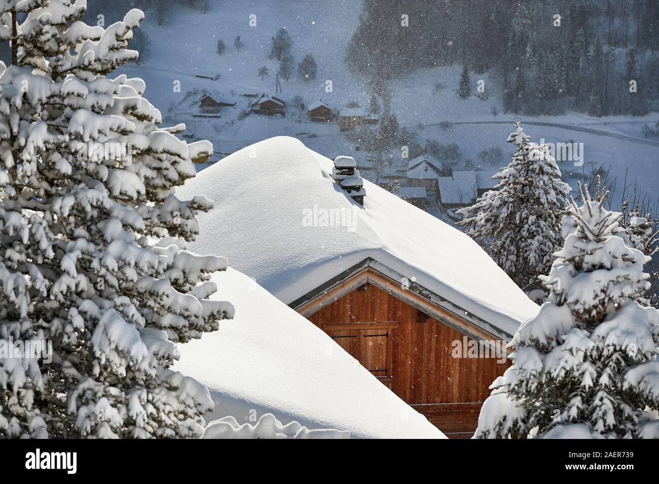 Winter mountain village, roof and chimney covered with snow Stock Photo ...