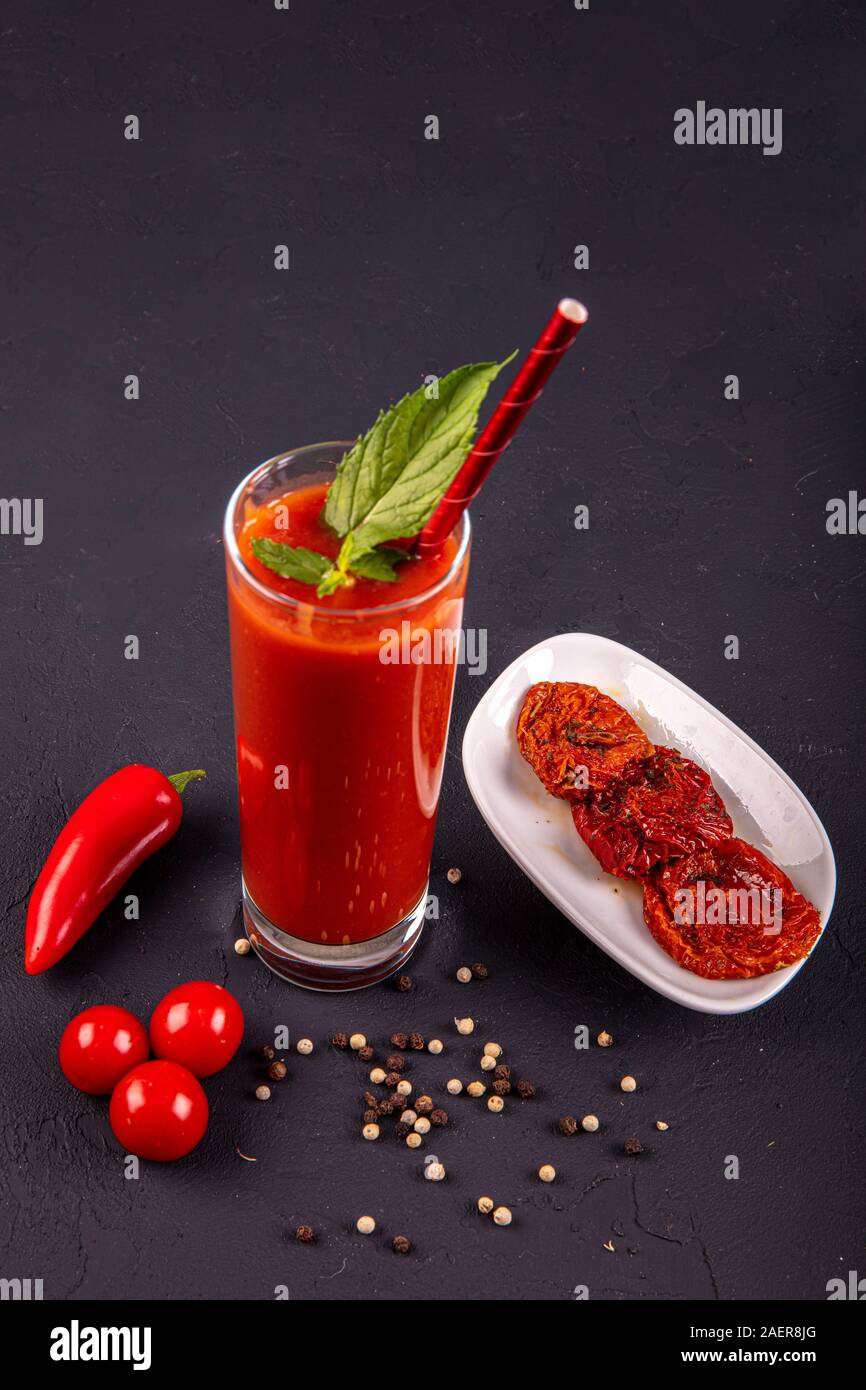 Bloody Mary at the bar counter. Classic cocktail. Dark background Stock ...