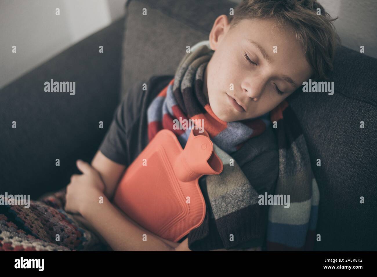 Sick teen boy in bed hi-res stock photography and images - Alamy