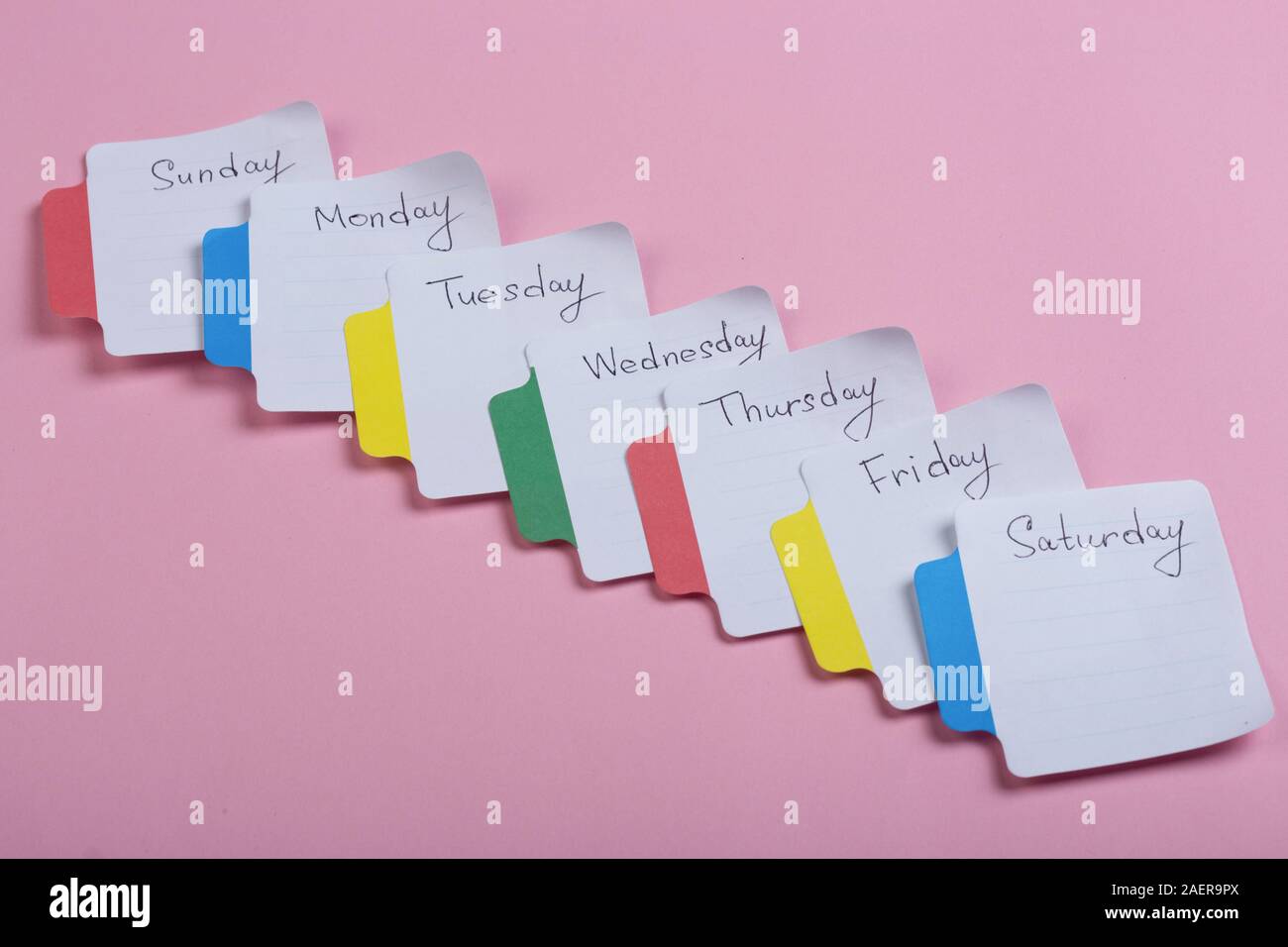 The days of the week - the paper stickers attached to the pink ...