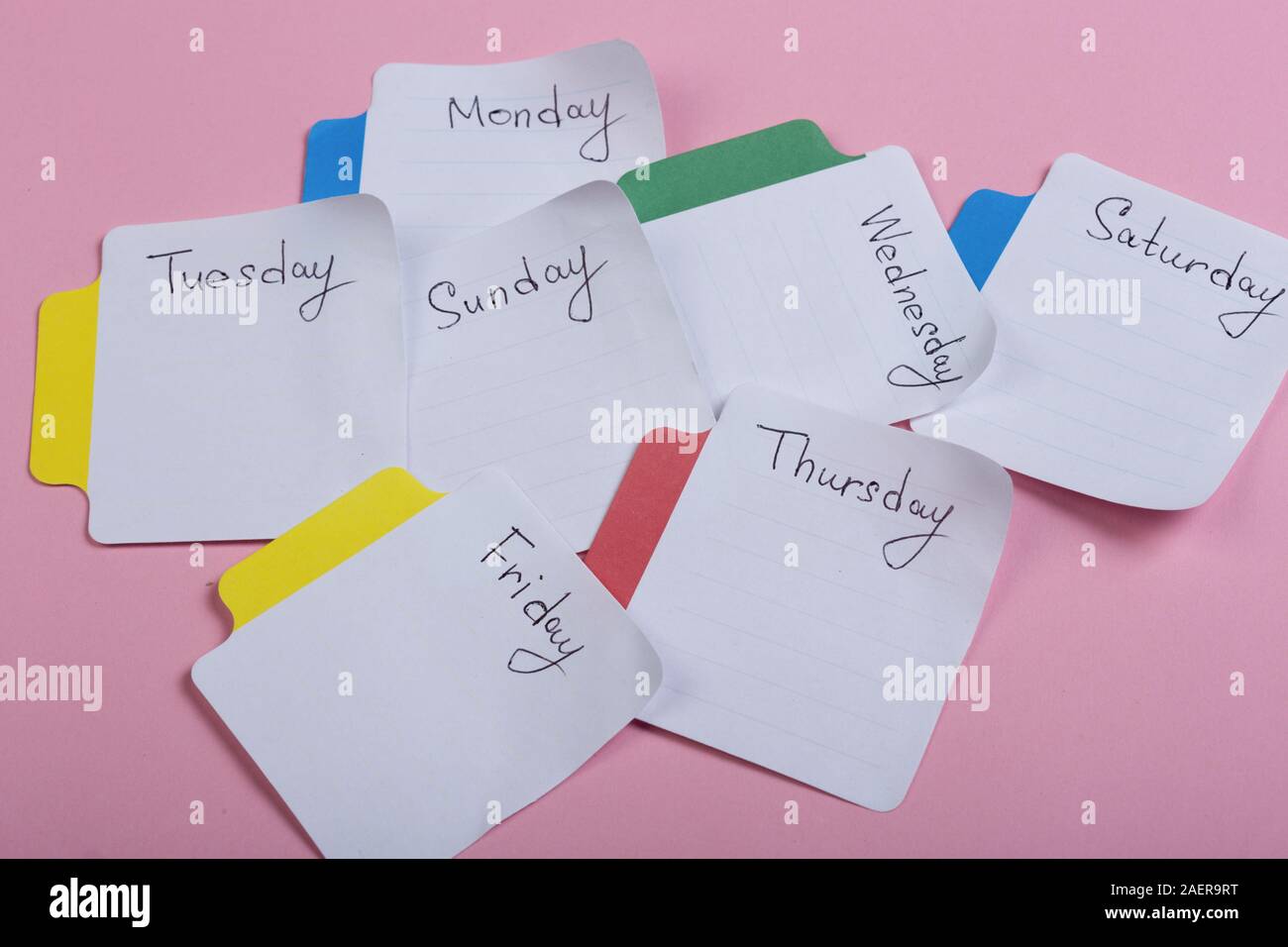 The days of the week - the paper stickers attached to the pink ...