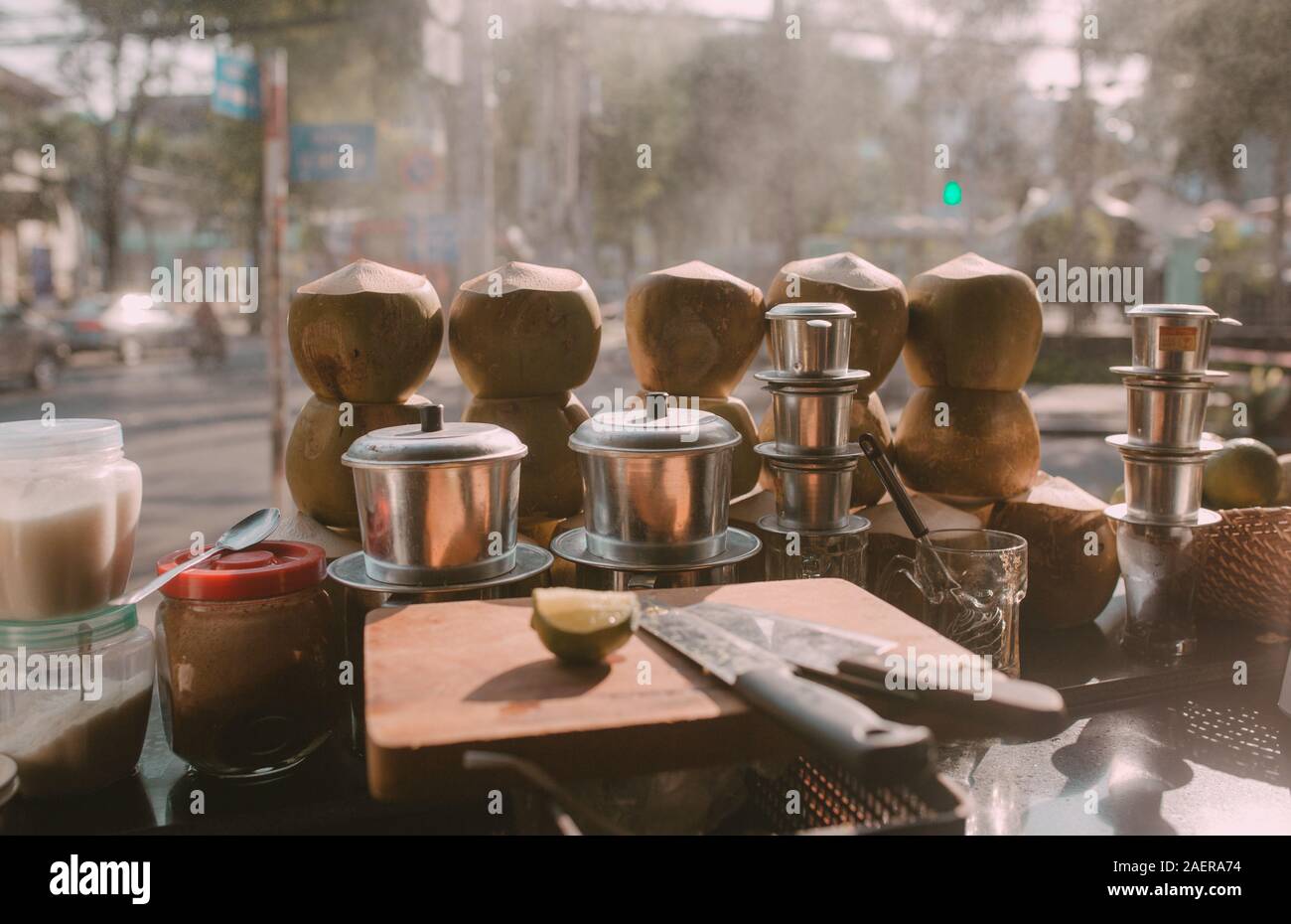 Coconuts in a bar on the street in Ho Chi Minh city Stock Photo - Alamy