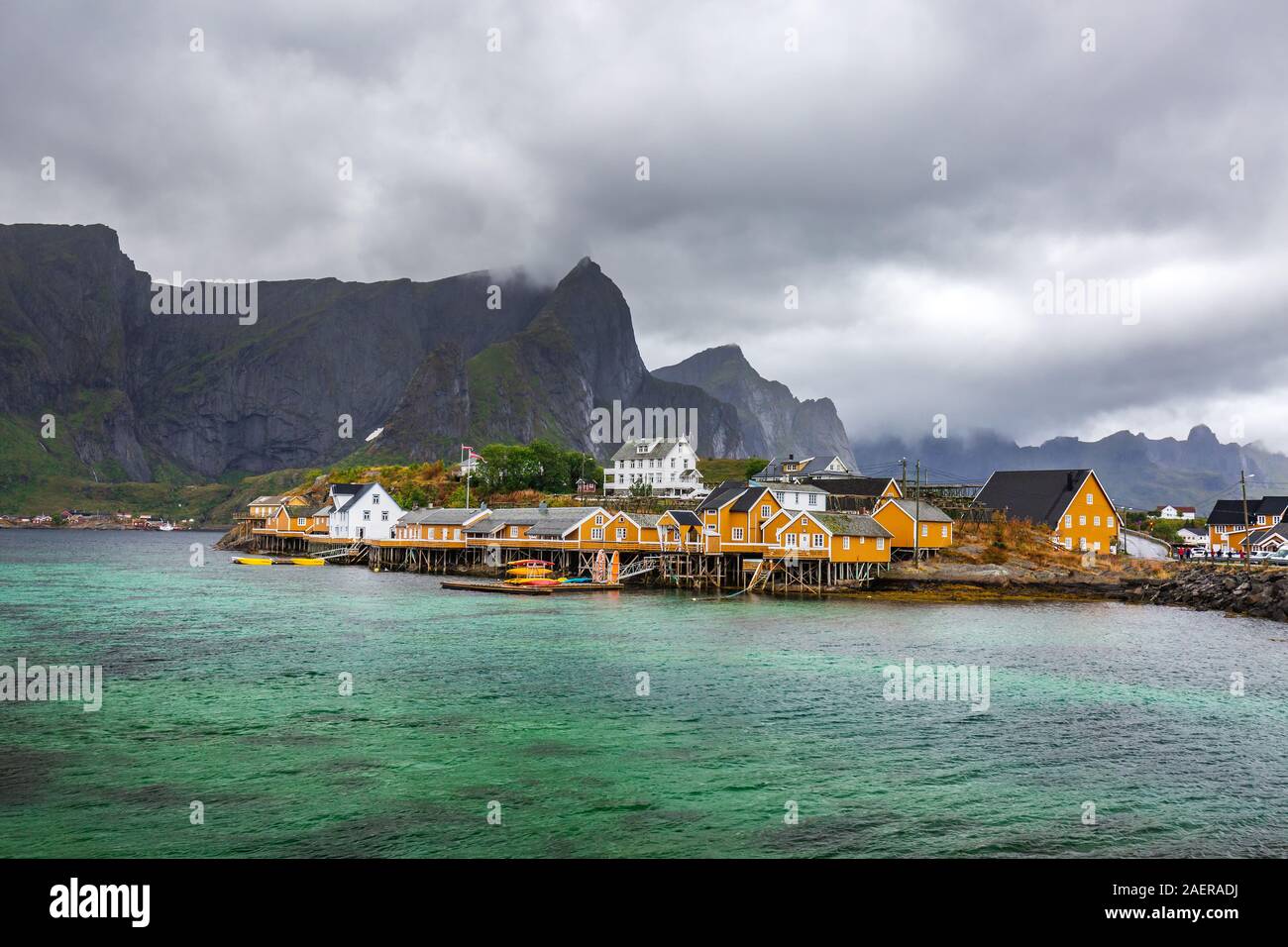 A yellow fishing cabin in Sakrisoy, a small fishing village in Moskenes ...