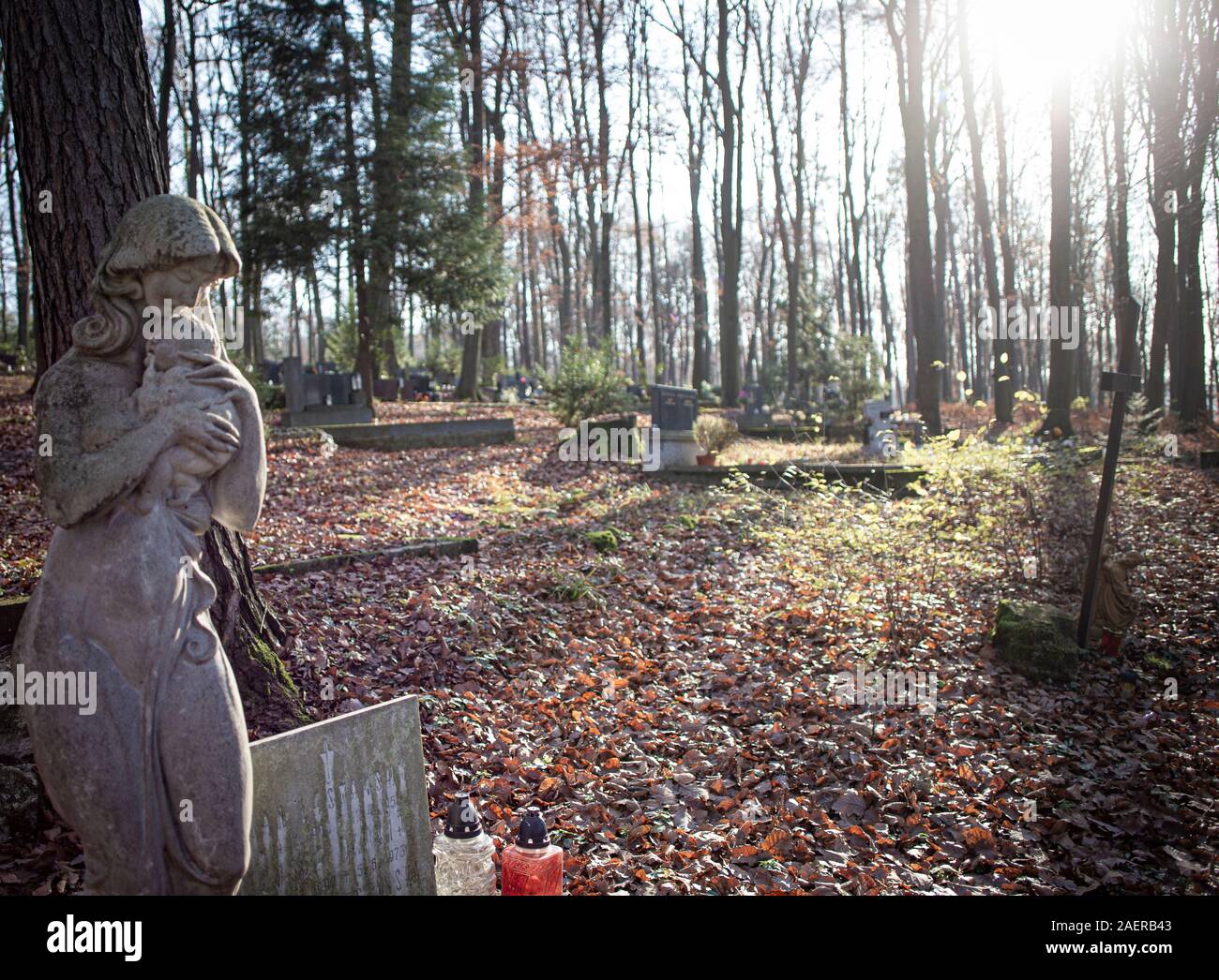 Woman walking in old graveyard hi-res stock photography and images - Alamy