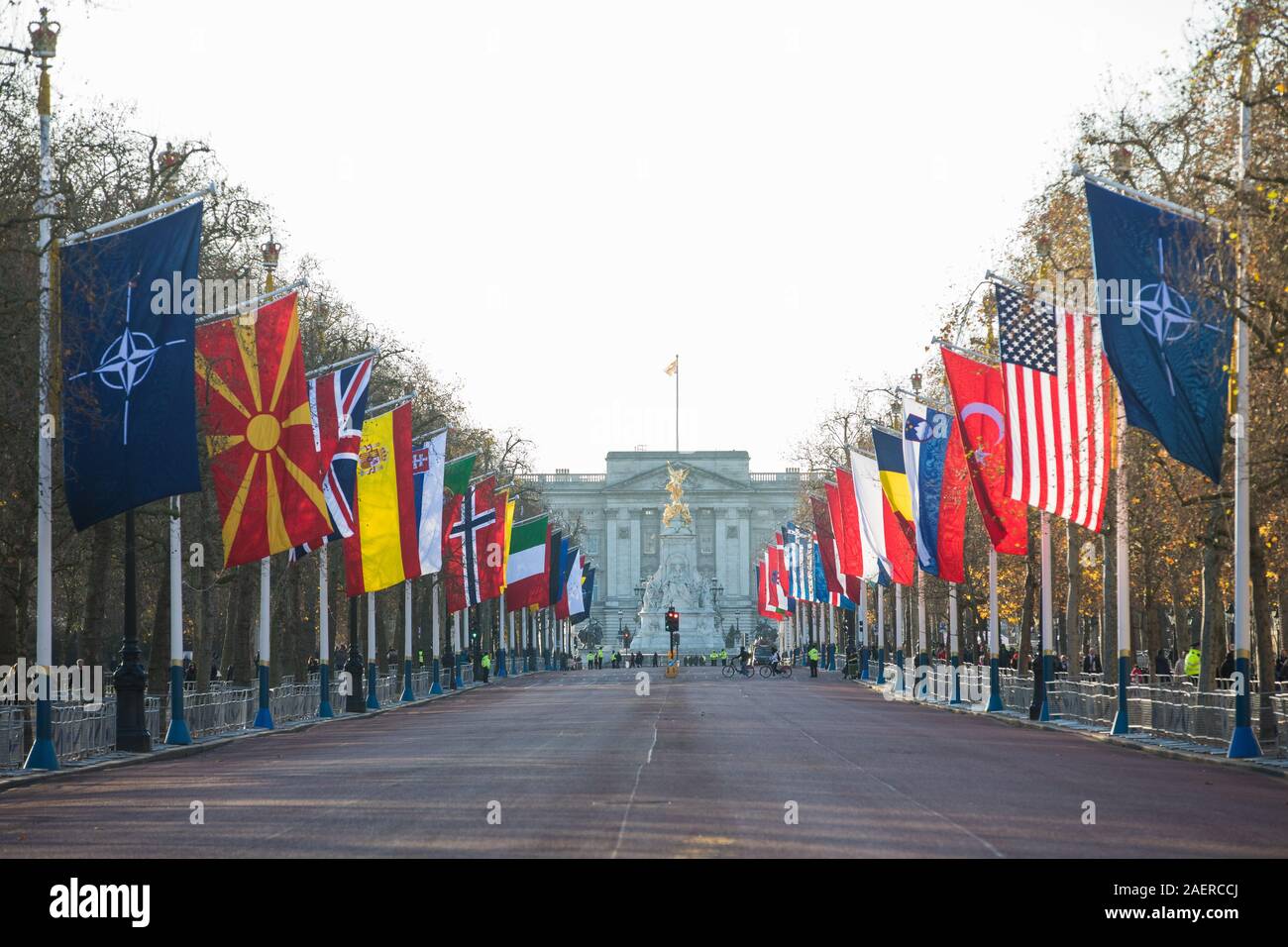 London, UK. 3 December, 2019. NATO flags and the flags of NATO members ...