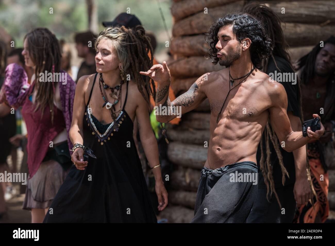 People dancing on the main stage of the psytrance Lost Theory festival ...