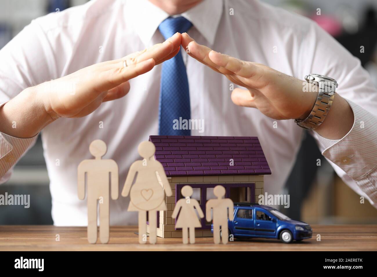 Family home protecting insurance hi-res stock photography and images ...