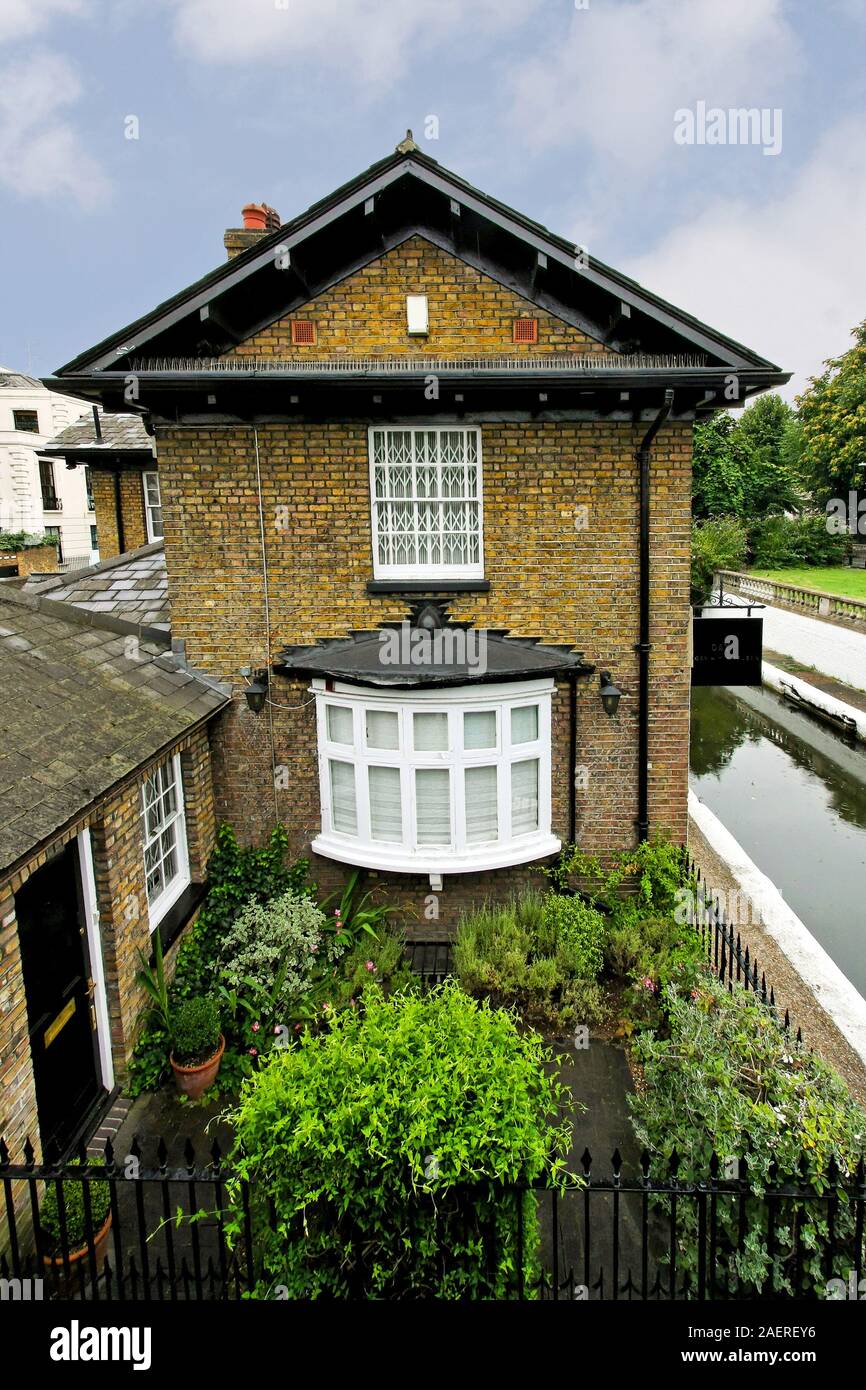 Small house with garden in English style Stock Photo - Alamy