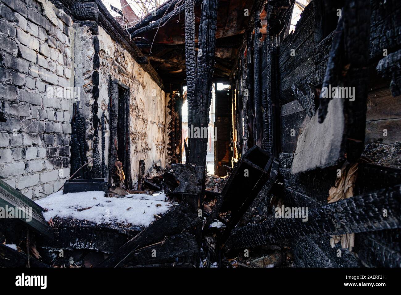 Consequences of fire. Completely burnt old rural house Stock Photo - Alamy
