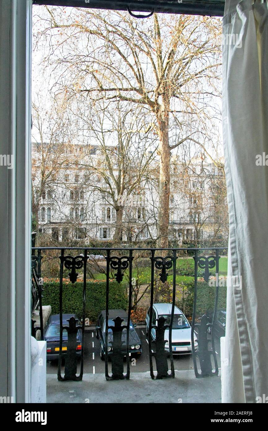 Park view from apartment through big window Stock Photo - Alamy
