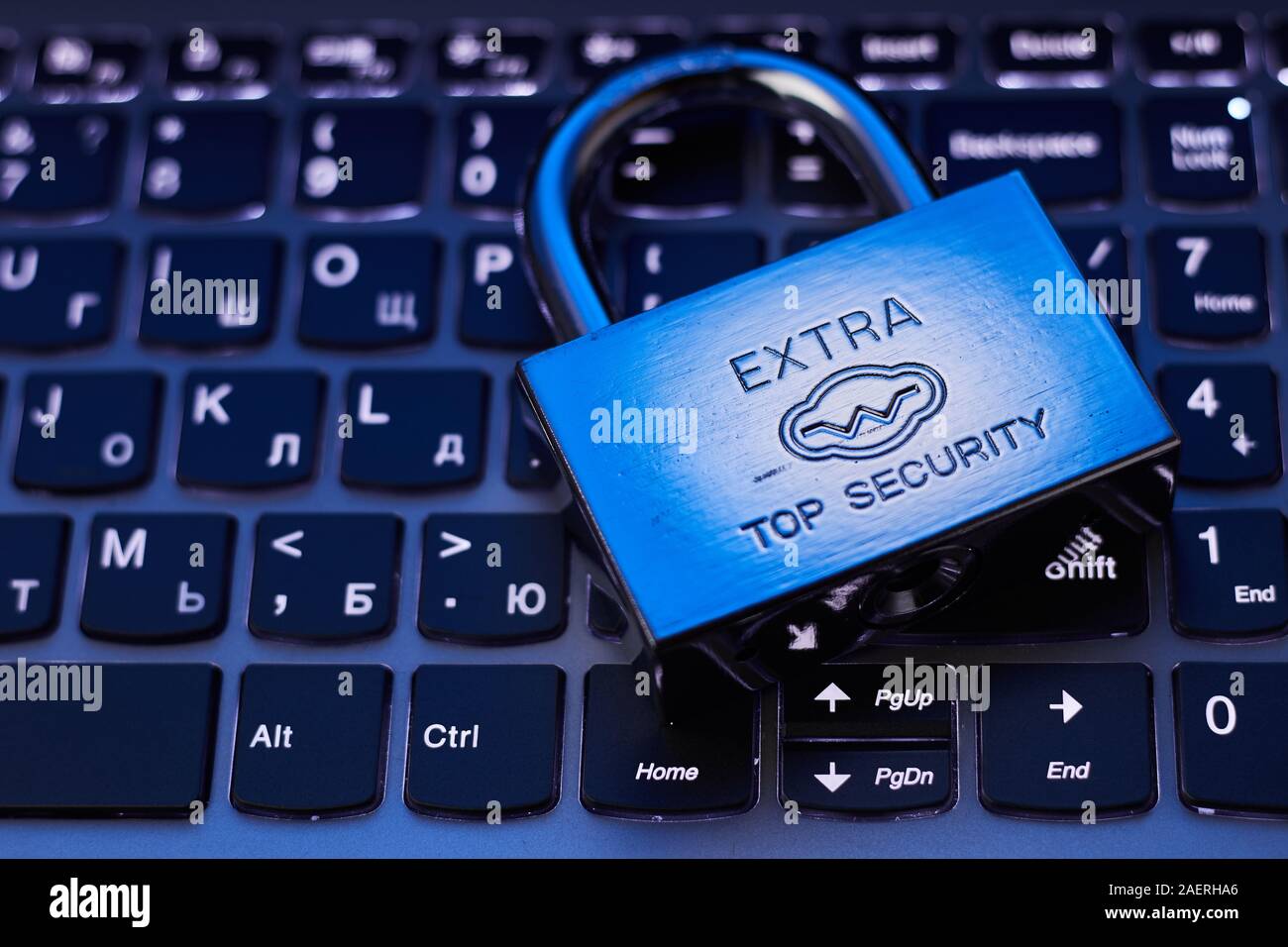 Selective focus on metal lock on keyboard password internet online data ...