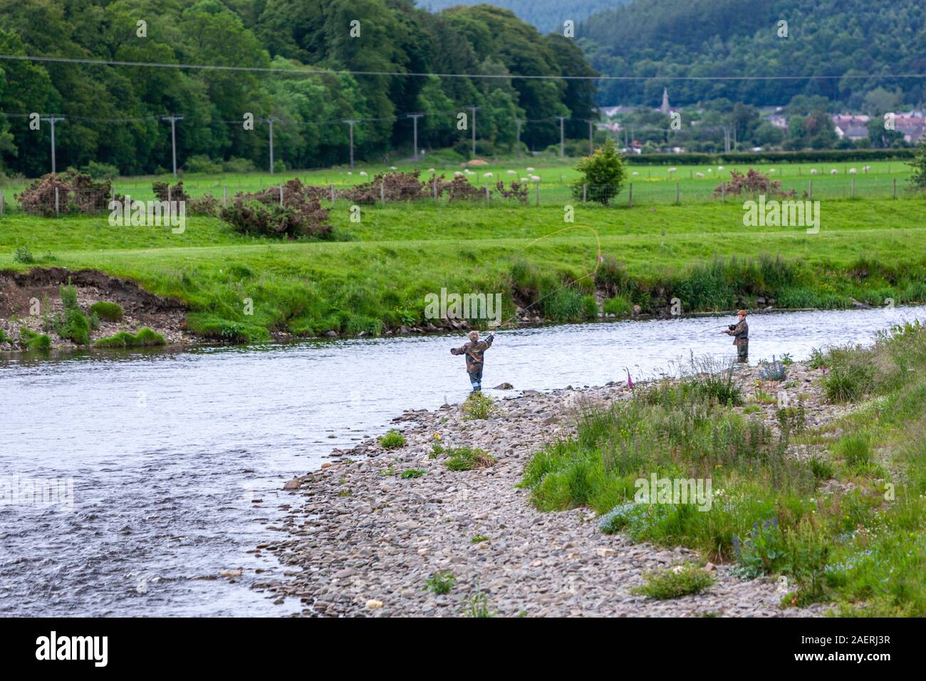 Two boys fishing by rod in tweed river hi-res stock photography and ...