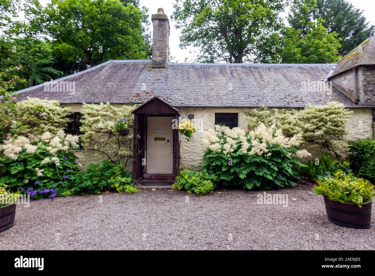 Service cottages outside Traquair House, style of a fortified mansion ...