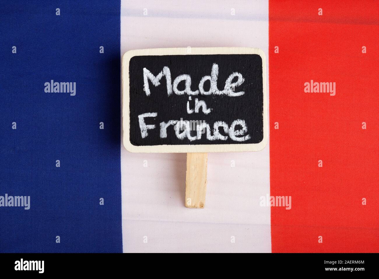 quality concept - French flag and blackboard with Text Made in France ...