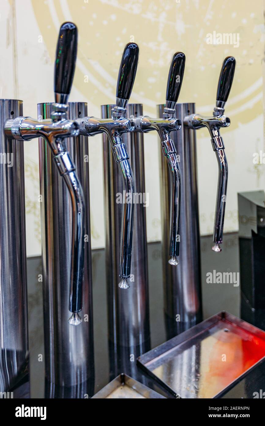 Silver beer taps hi-res stock photography and images - Alamy