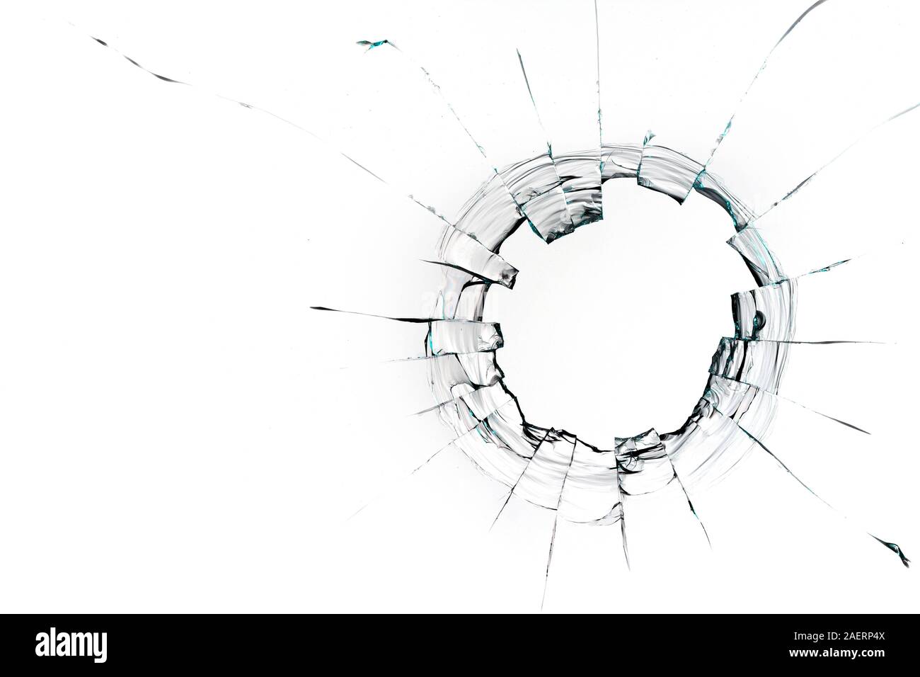 Cracks in a bullet punched glass, for use in design and special effects ...