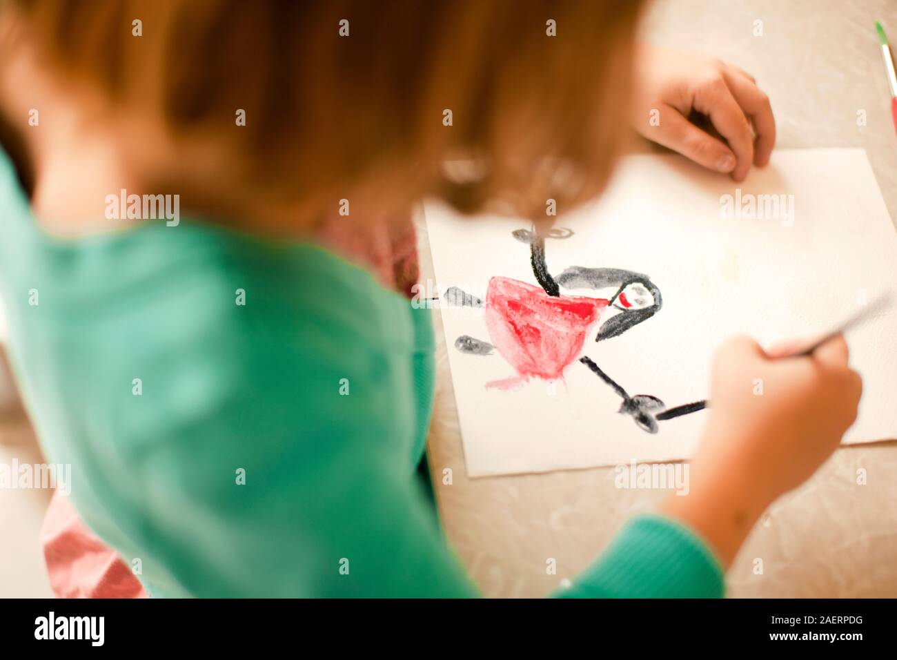 Girl drawing a picture Stock Photo - Alamy