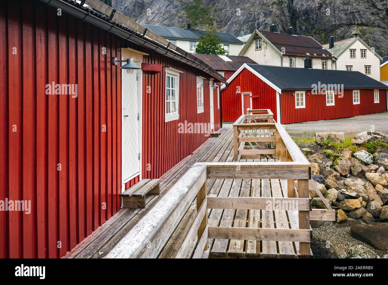 Traditional red wooden houses, rorbuer in the small fishing village of ...