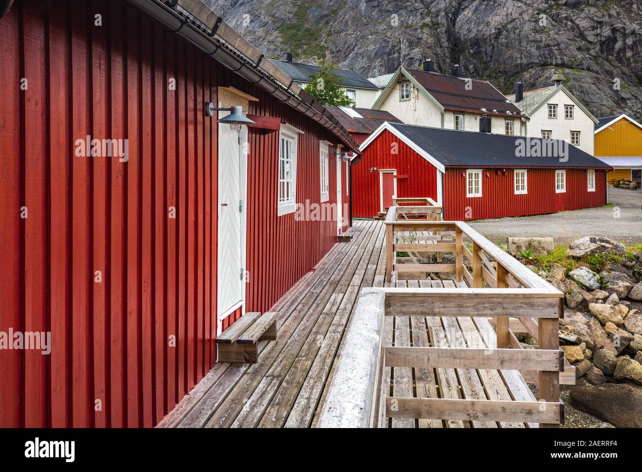 Traditional red wooden houses, rorbuer in the small fishing village of ...