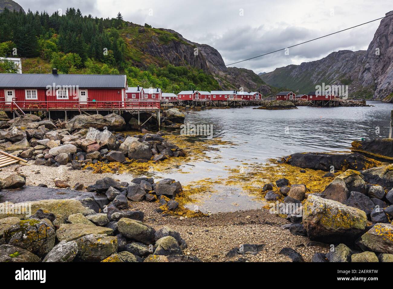 Traditional red wooden houses, rorbuer in the small fishing village of ...