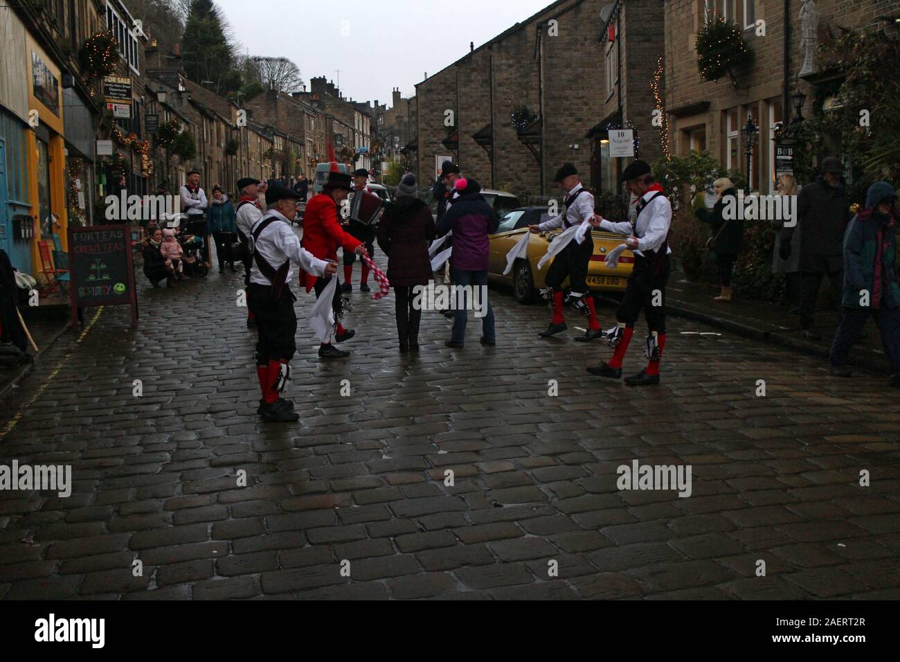 Morris dancers in Main Street, Haworth prior to the torchlight parade ...