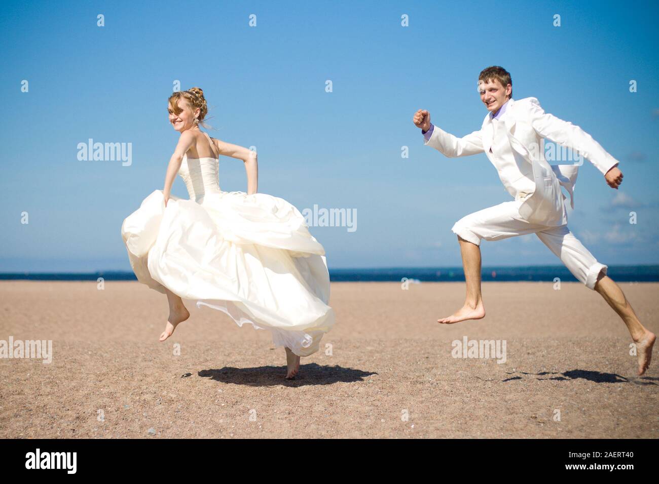 Happy couple in love looking deeply into each others eyes, touching ...