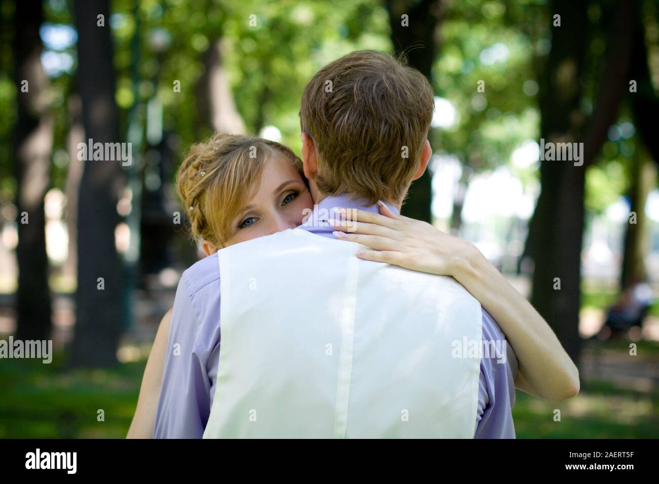 Happy couple in love looking deeply into each others eyes, touching ...