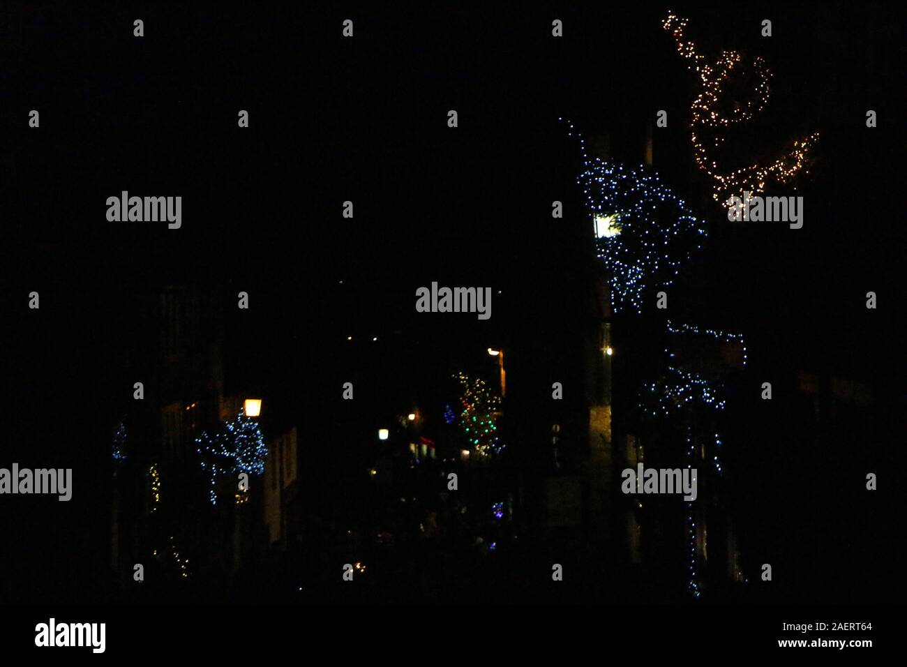Christmas torchlight parade in Main Street Haworth Stock Photo - Alamy