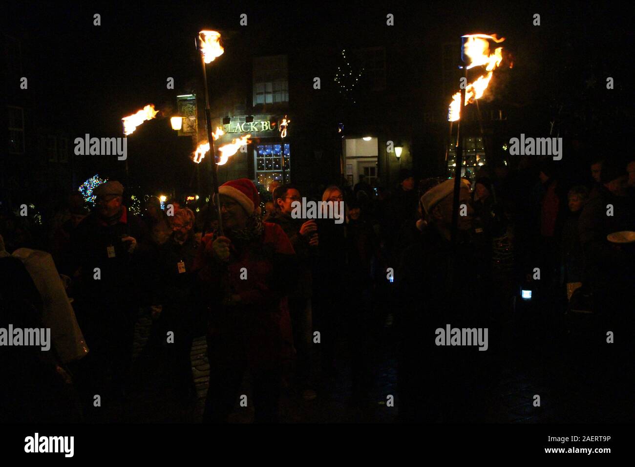 Christmas torchlight parade in Main Street Haworth Stock Photo - Alamy