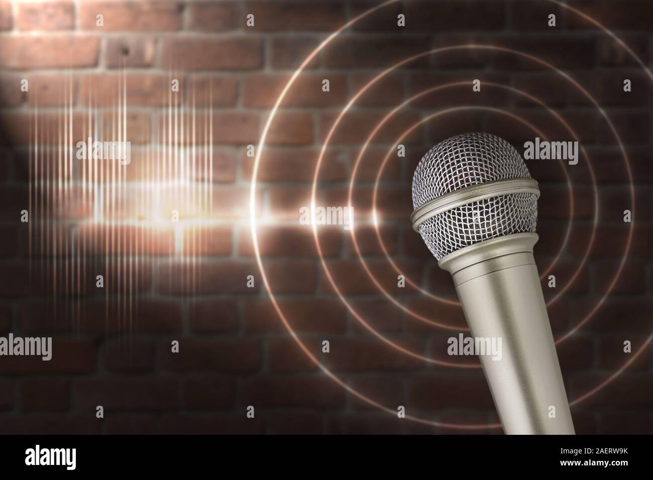 Microphone on a brick wall background. The concept of the microphone ...
