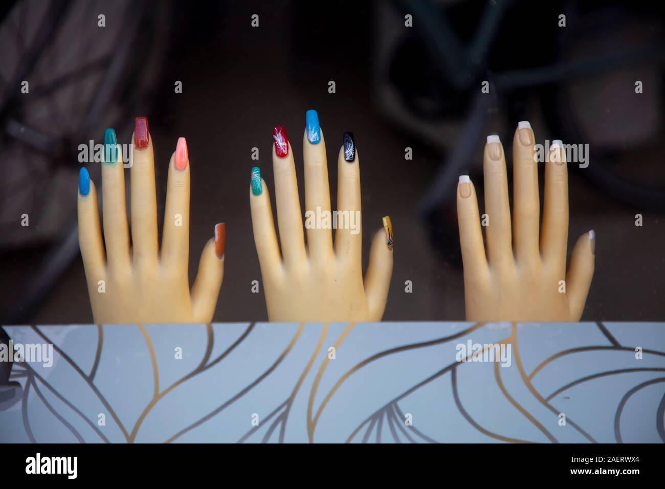 Display in a nagestudio, colorful fingernails on mannequin hands Stock ...