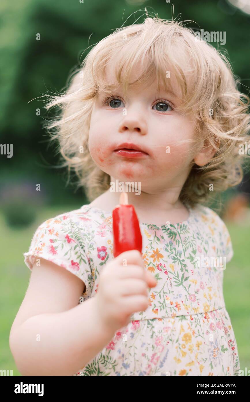 Girl Eating A Popsicle High Resolution Stock Photography and Images - Alamy