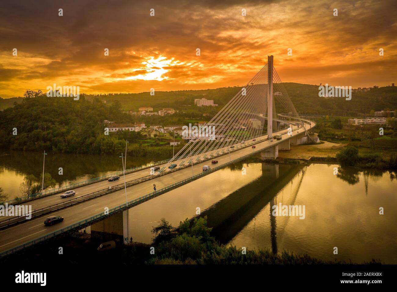 View of the Ponte Rainha Santa Isabel in Coimbra over the Mondego river ...