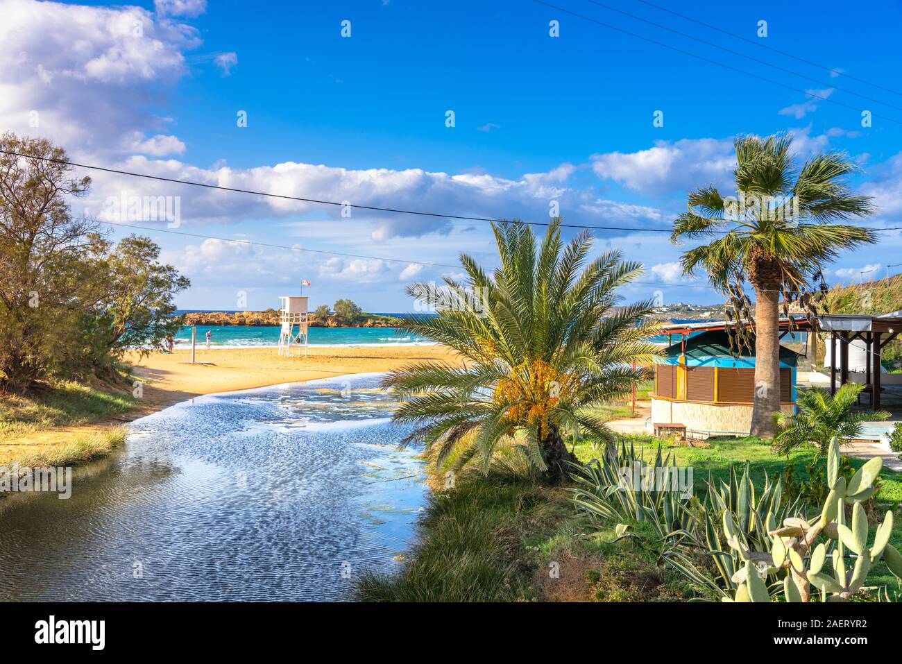 Sandy beach of Kalathas with the picturesque islet in Akrotiri Chania ...