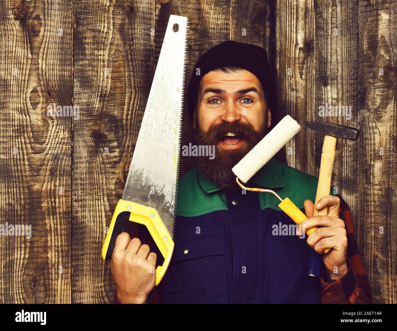 bearded builder, long beard, brutal caucasian hipster with moustache ...