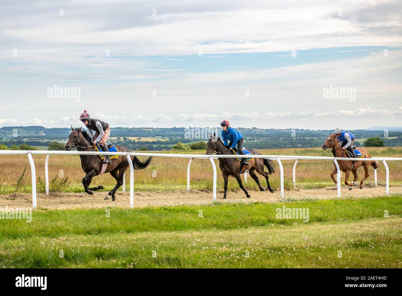 Middleham, England - A group of equestrians practice jockeying on a ...