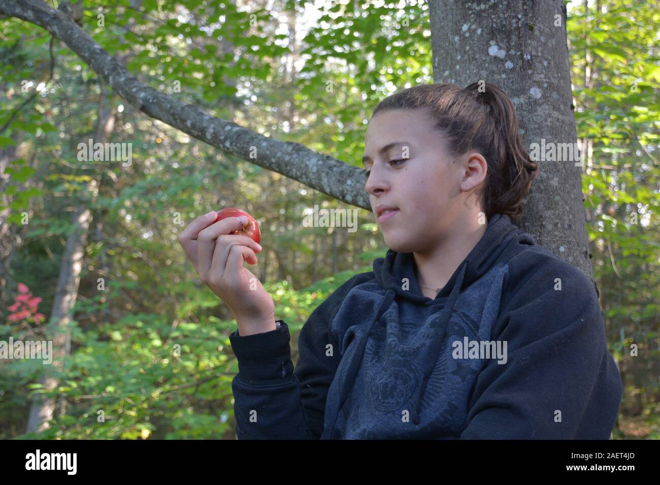 Girl enjoying apple hi-res stock photography and images - Alamy