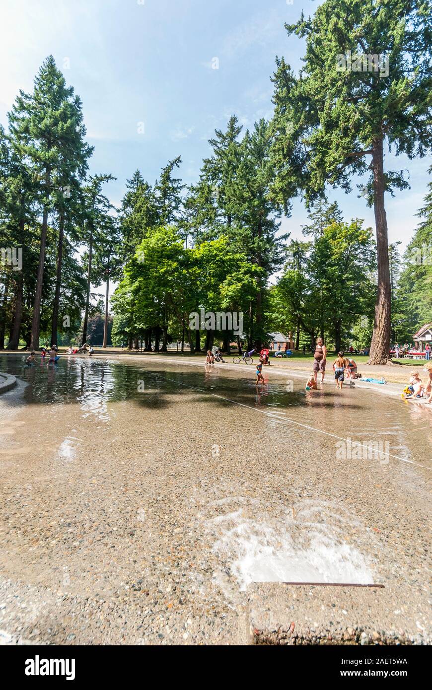 Woman wading in pool hi-res stock photography and images - Alamy