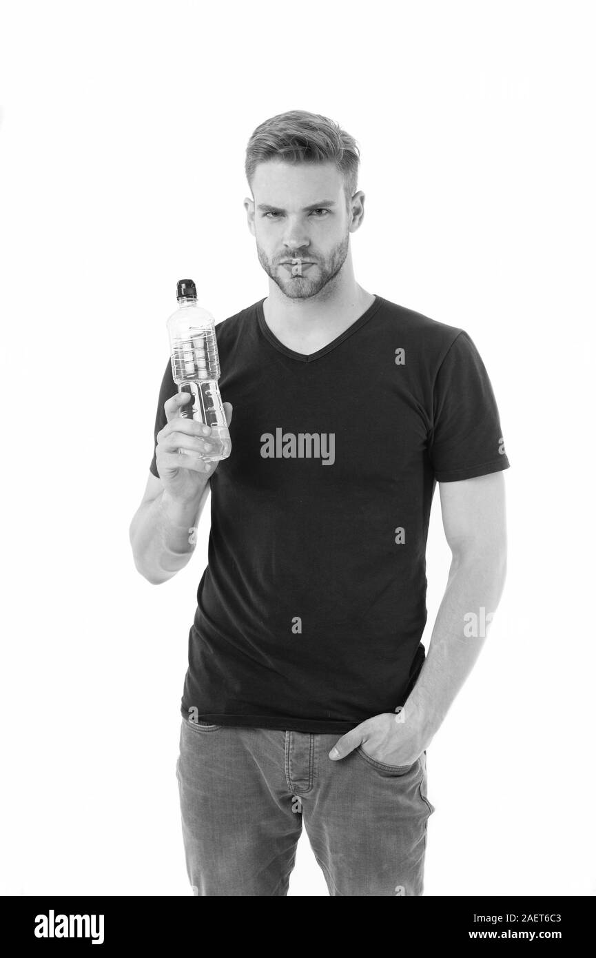 Stay hydrated. Man athletic sportsman hold bottle water. Man casual ...