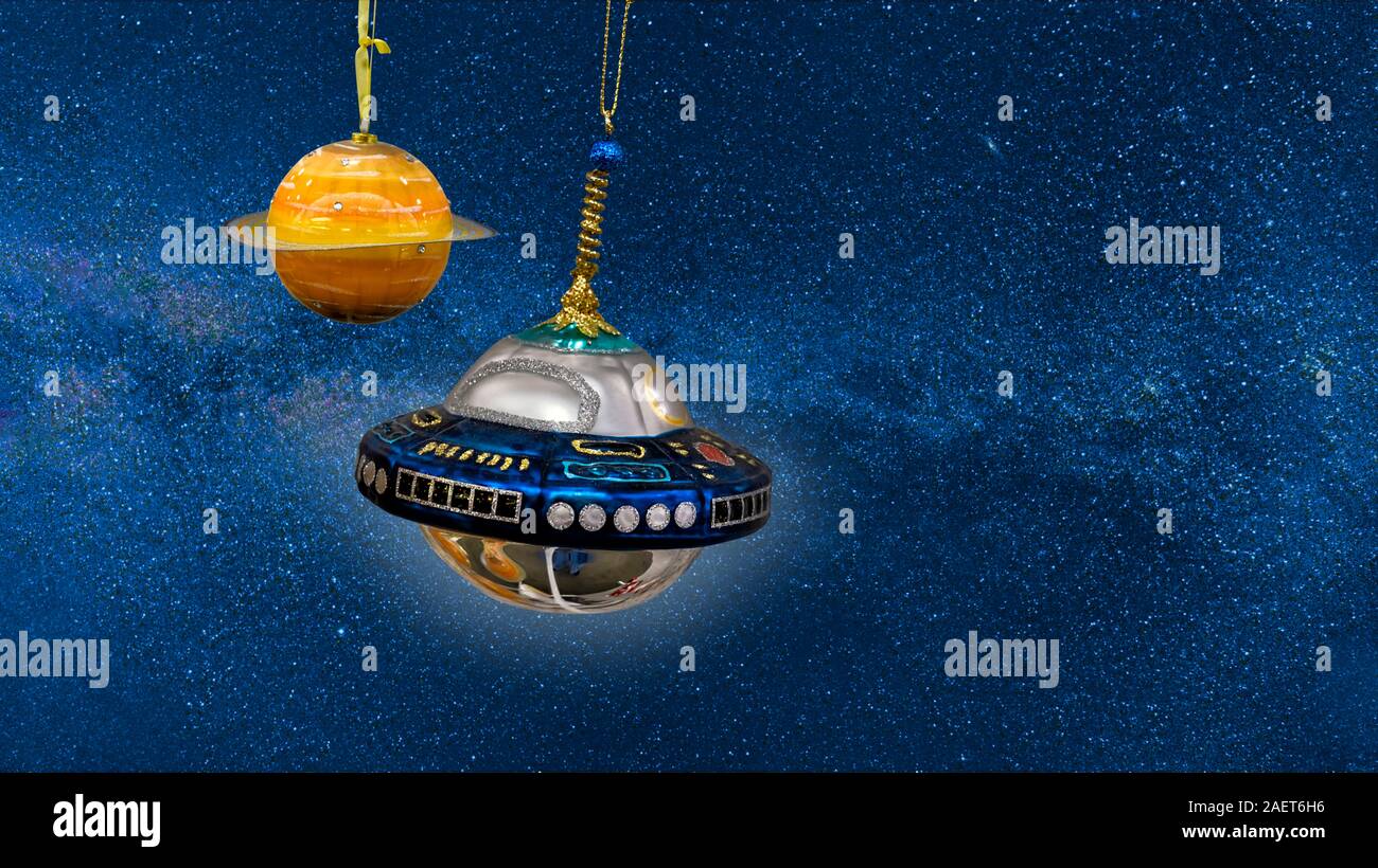 Out of this world spaceship and Saturn Christmas ornaments in outer ...
