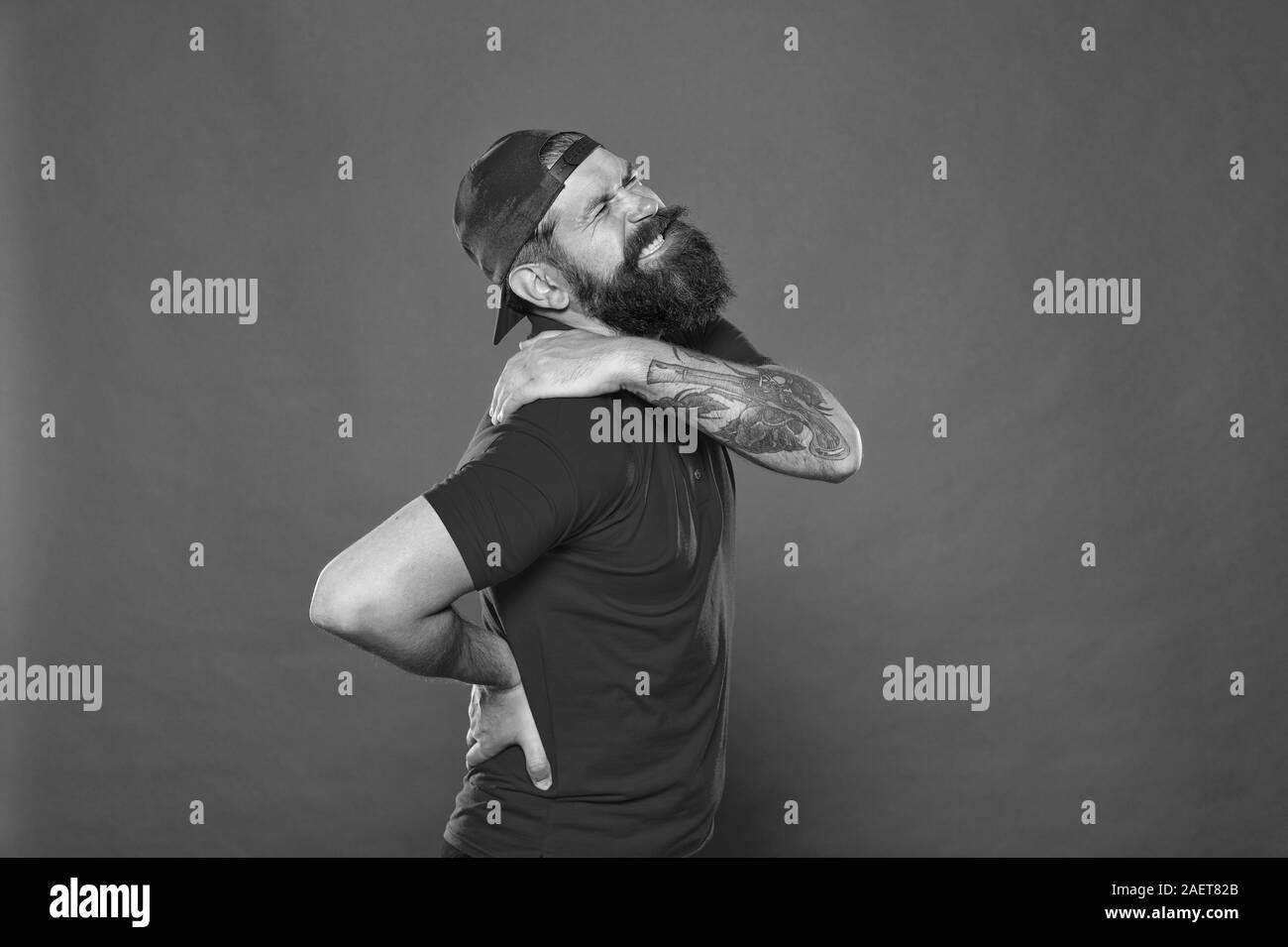 Shoulder pain at work Black and White Stock Photos & Images - Alamy