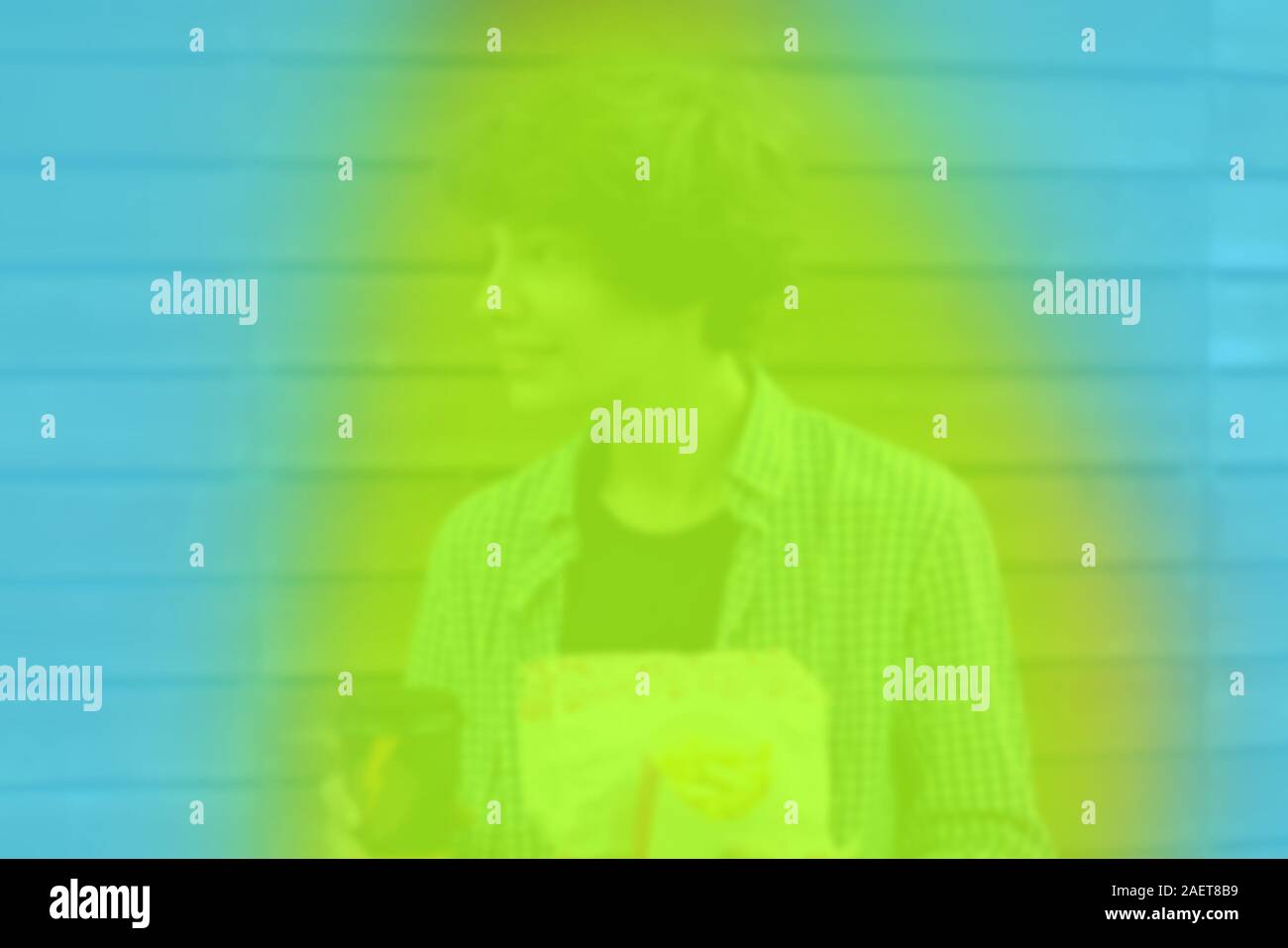 infrared scanner with teal and orange or yellow tones of a man ...