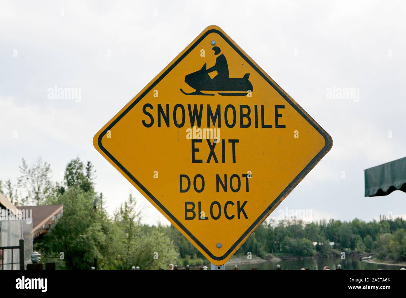 Snowmobile Exit road sign in Fairbanks, AK Stock Photo - Alamy