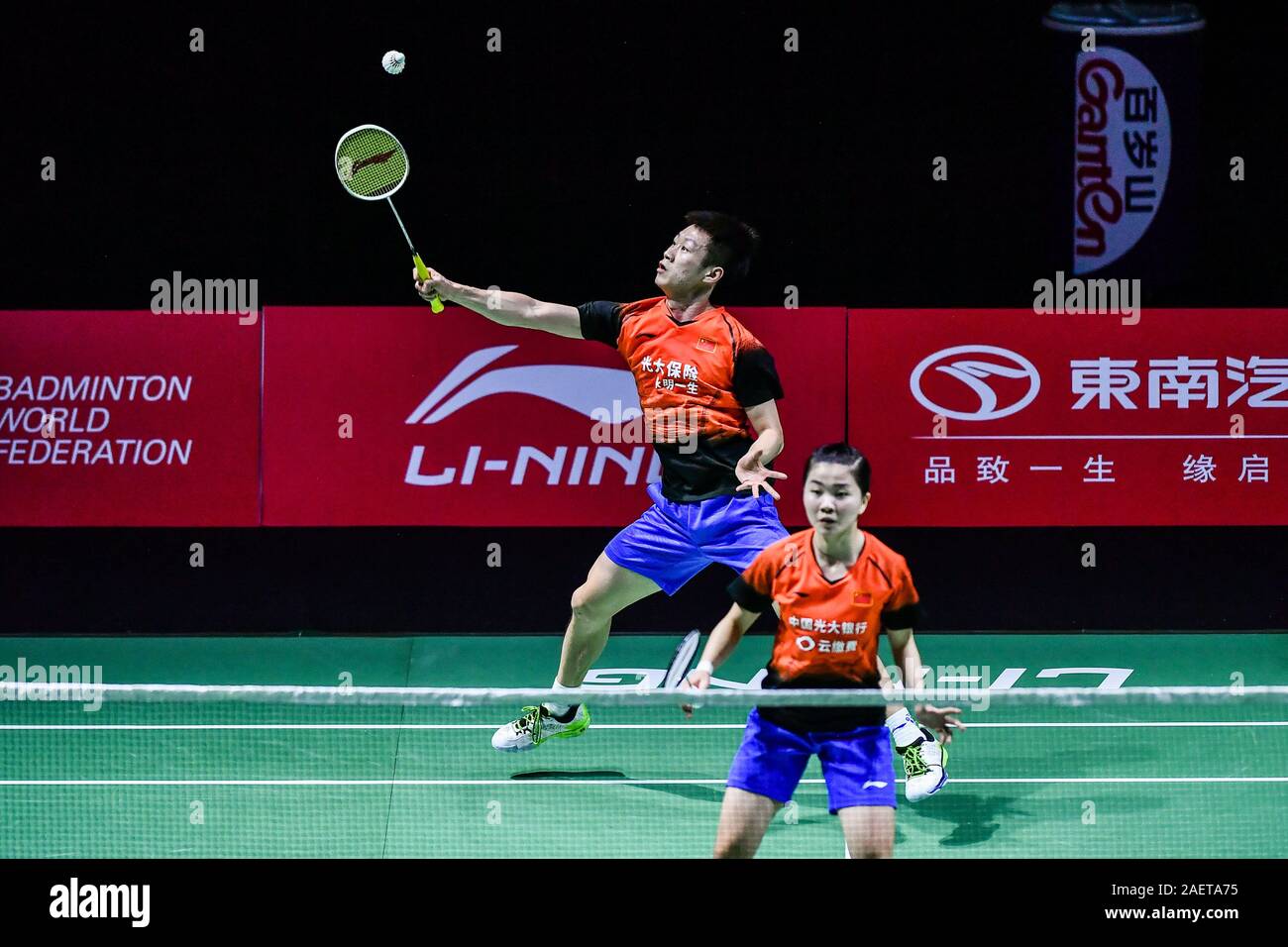 Ren Xiaoyu and Zhou Chaomin of China get the ball against Kouhei Gondou ...