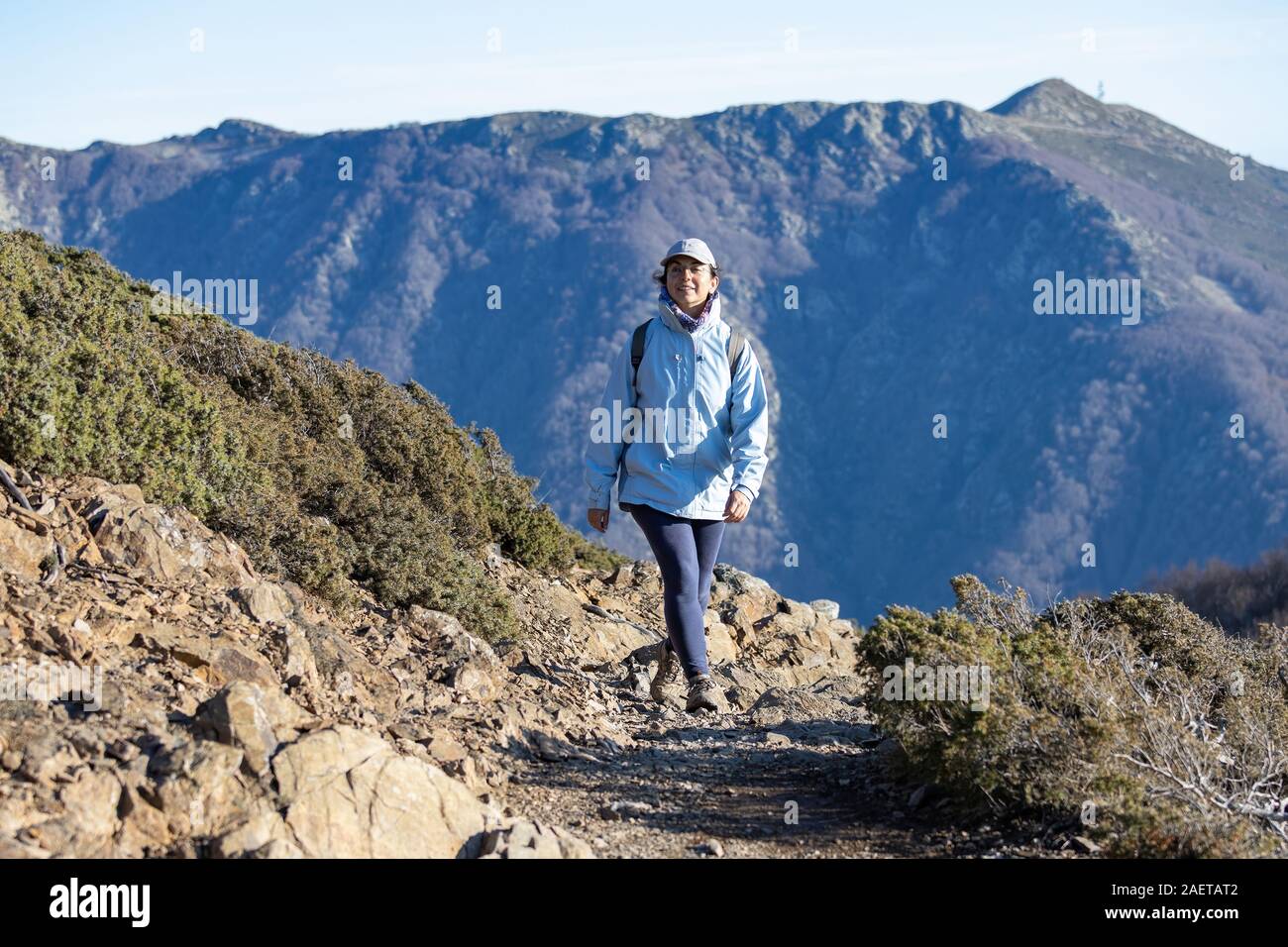 Spanish tourist woman walking in the Spanish mountain Montseny Stock ...