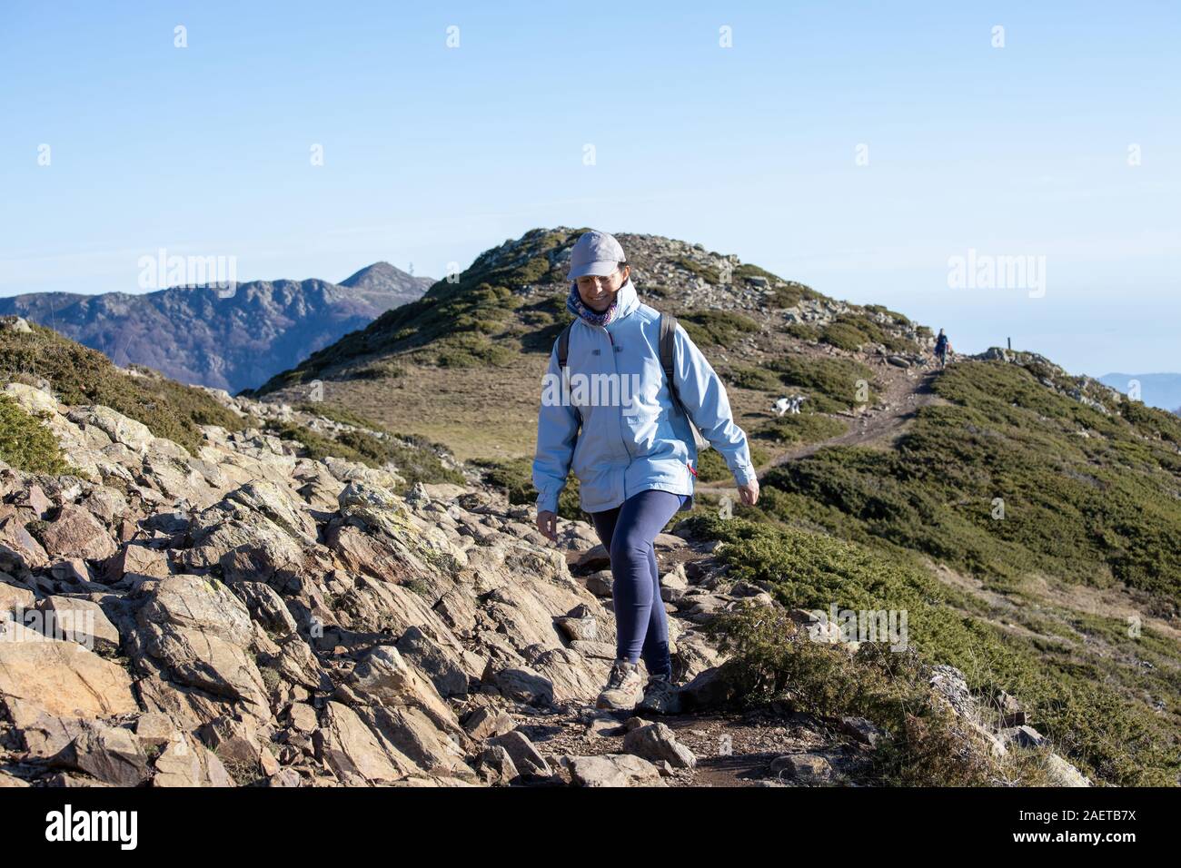 Spanish tourist woman walking in the Spanish mountain Montseny Stock ...