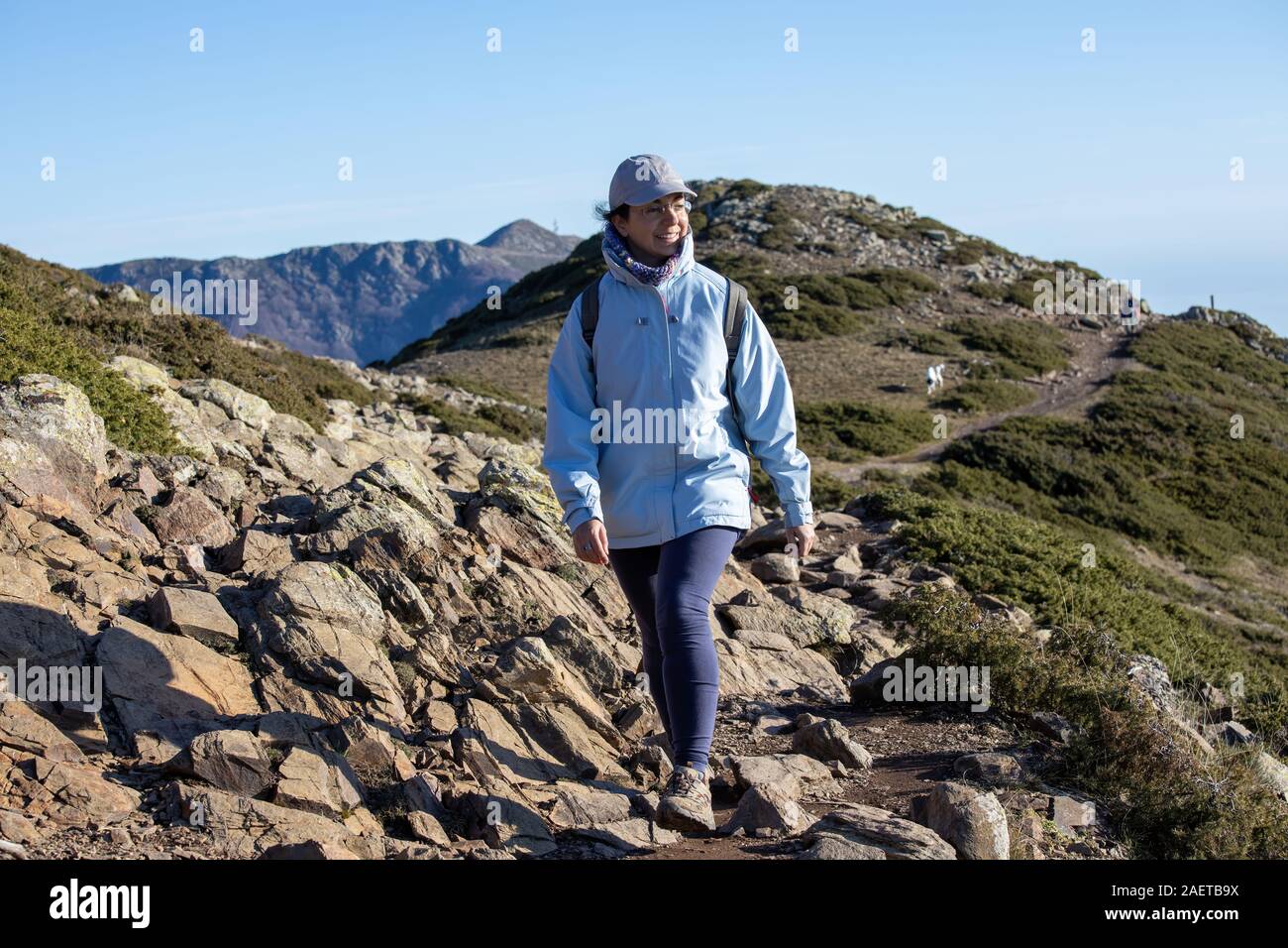 Spanish tourist woman walking in the Spanish mountain Montseny Stock ...